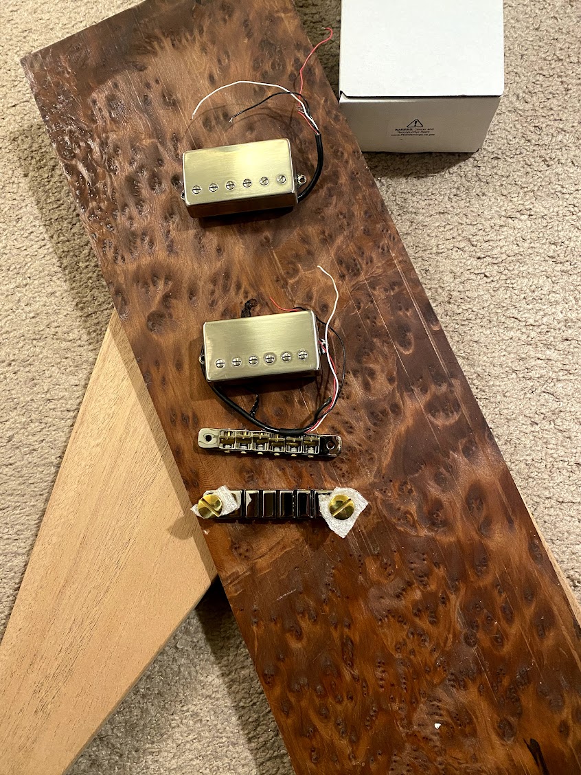 Finally, an example where fingerboard inlays are semi-functional AND ...